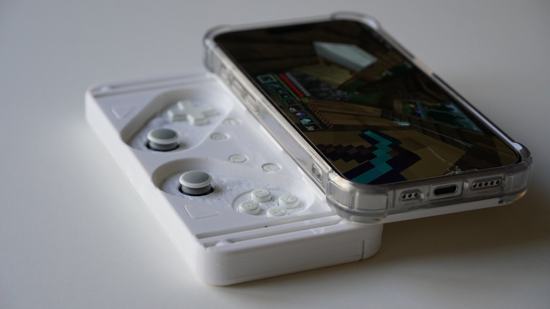 Il prototipo di controller M-Con trasformerà il suo iPhone in una PSP ...